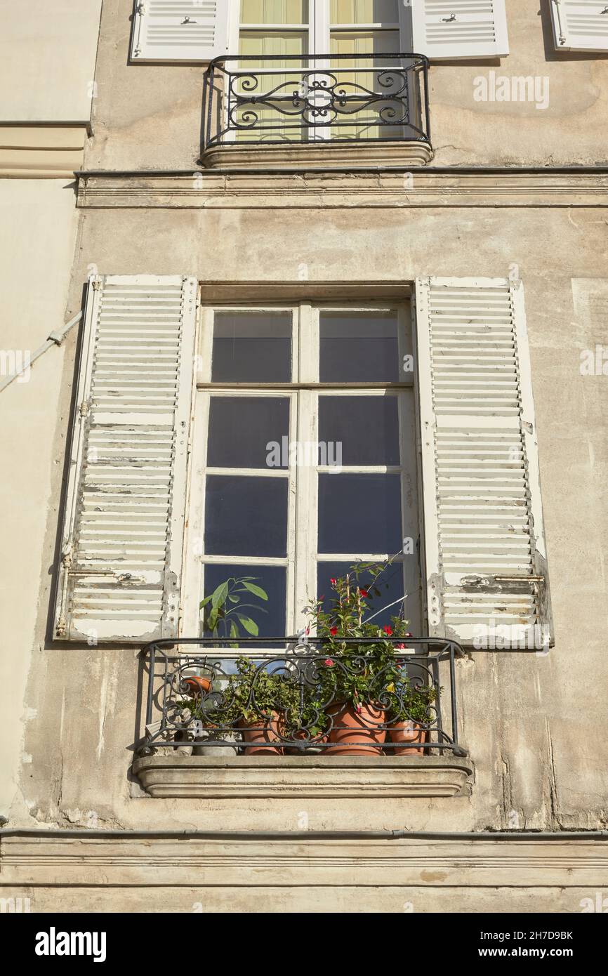 Classic Paris window with shutters and flower pots Stock Photo - Alamy