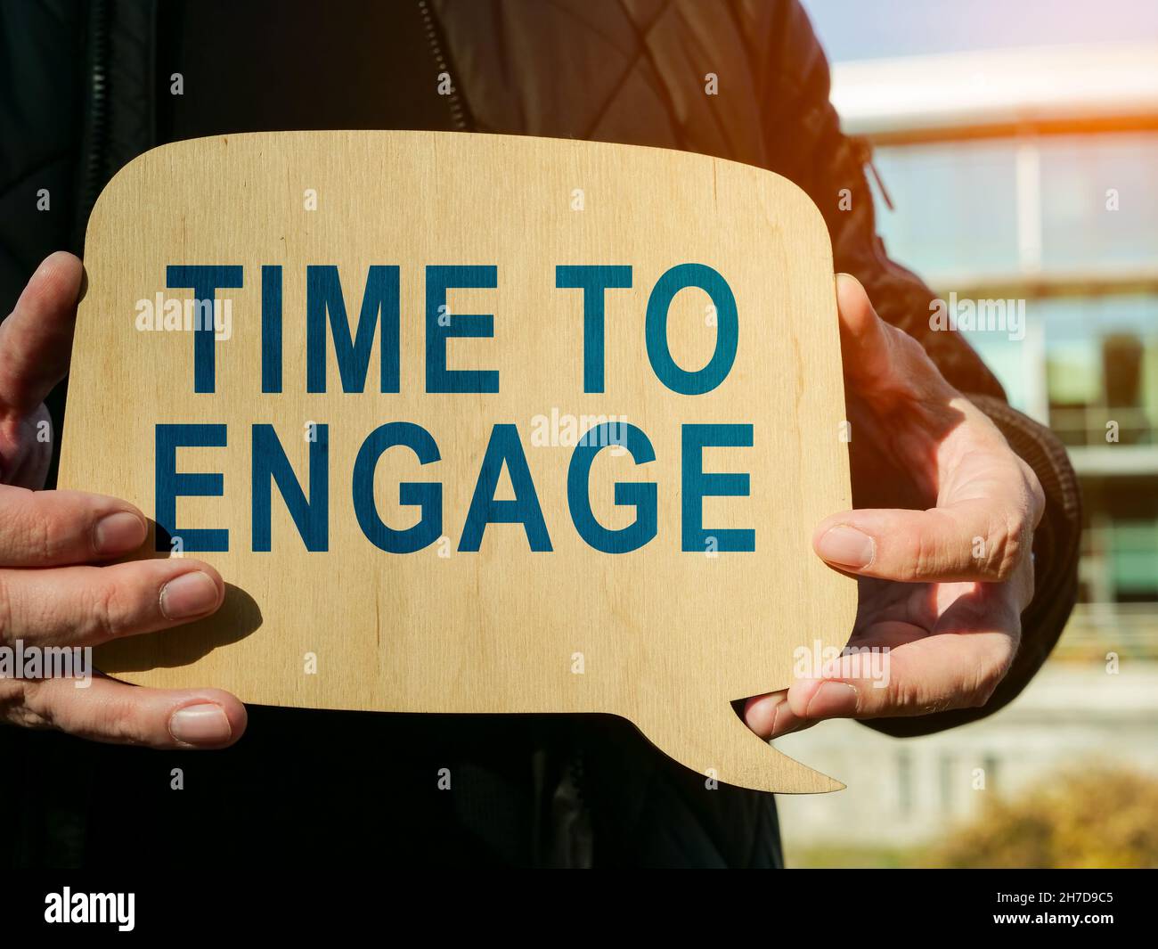 Time to engage phrase on the small poster Stock Photo - Alamy