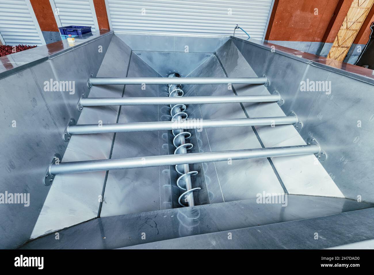 a machine for squeezing wine at the winery. The resulting juice and ...