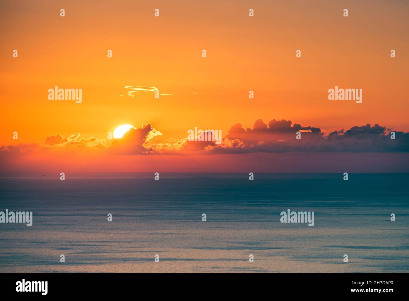 A magical seascape with bright colors in sunset time Stock Photo - Alamy
