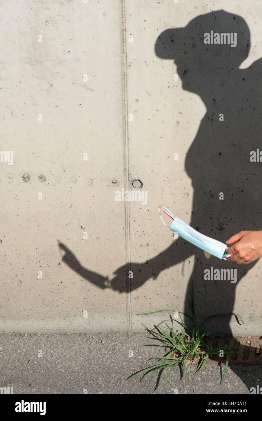 Shadow of Man with Surgical Mask Stock Photo - Alamy