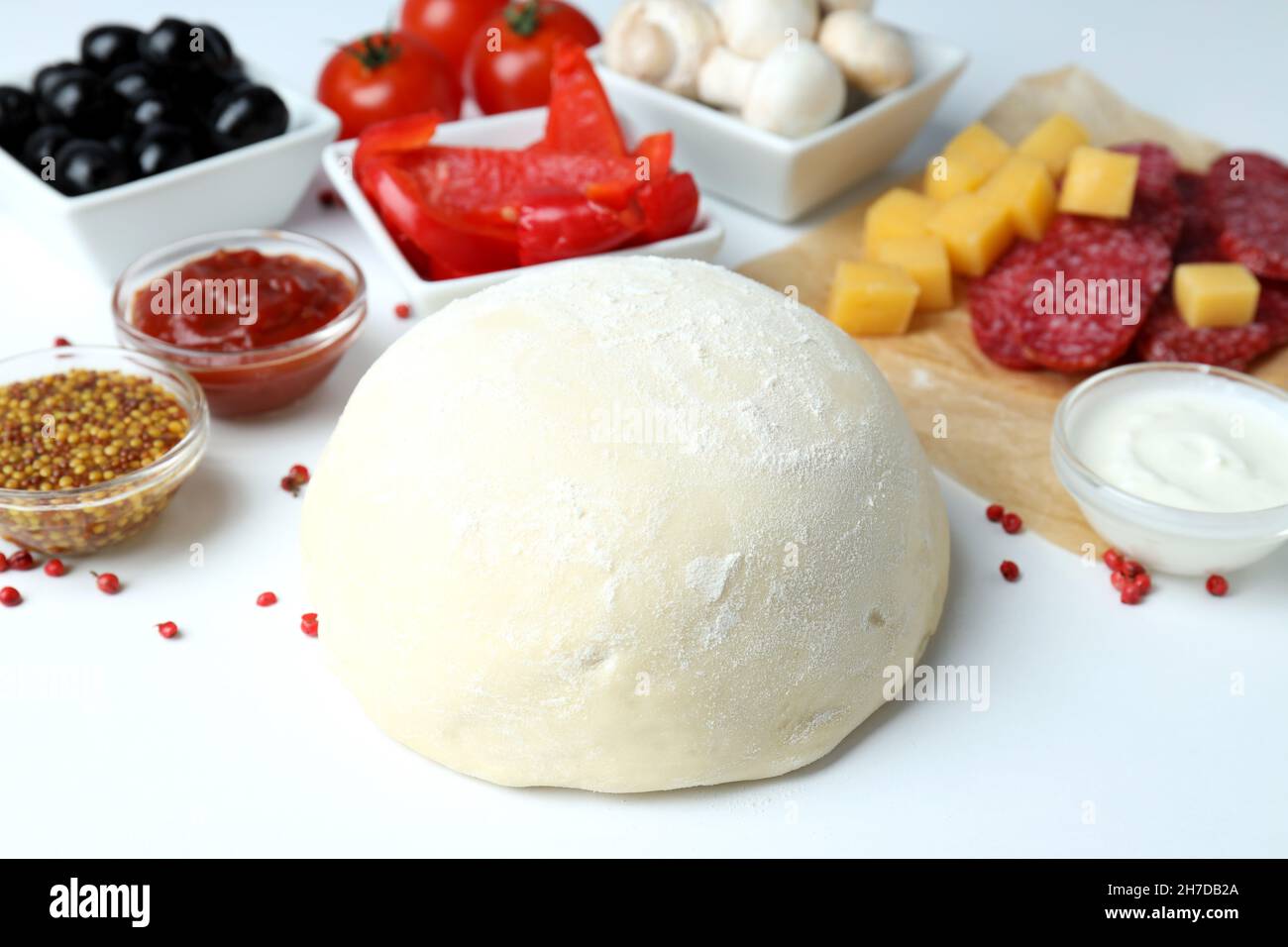 Concept of cooking pizza on white background Stock Photo - Alamy