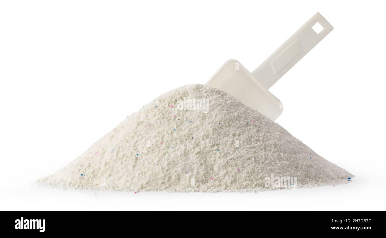 pile of detergent powder with measuring spoon isolated on white ...