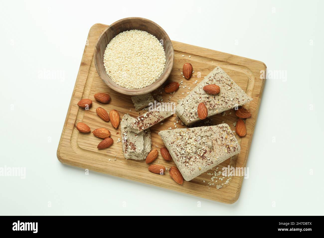 Concept of tasty food with halva on white background Stock Photo - Alamy