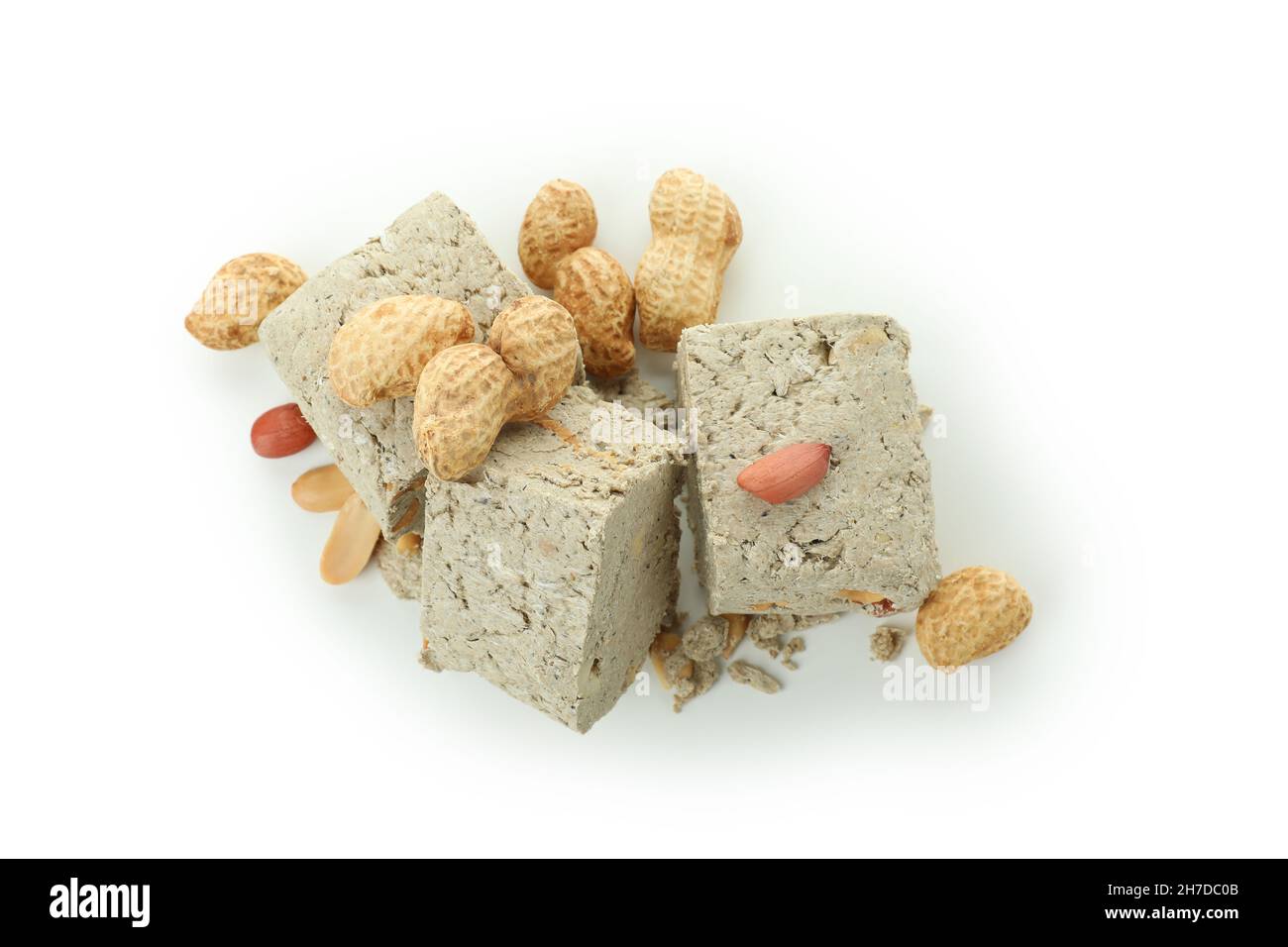 Halva with nuts isolated on white background Stock Photo - Alamy