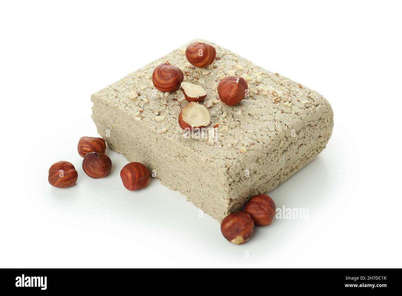 Halva with nuts isolated on white background Stock Photo - Alamy