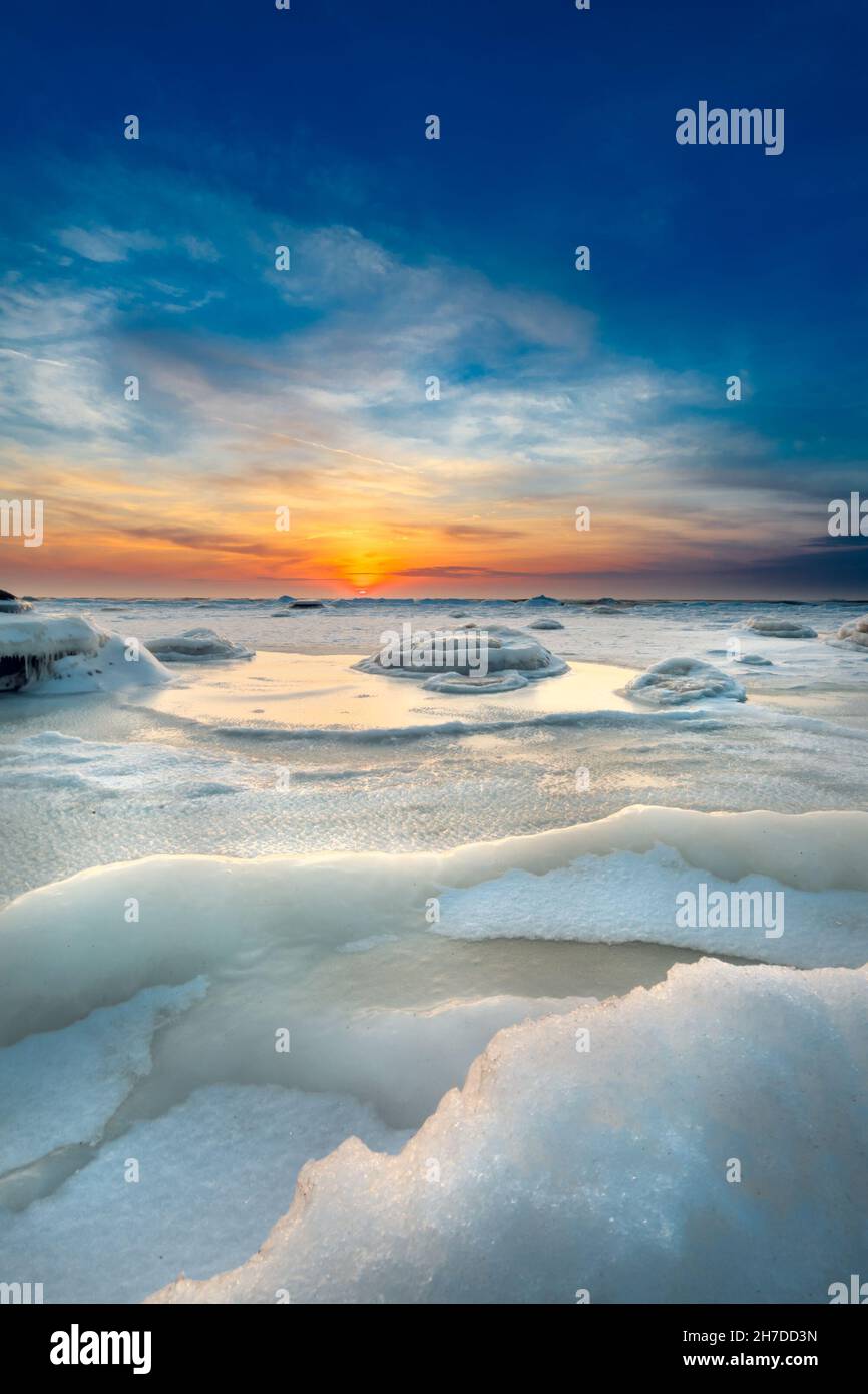 Snowy coast of Baltic Sea in Lithuania at sunset Stock Photo - Alamy