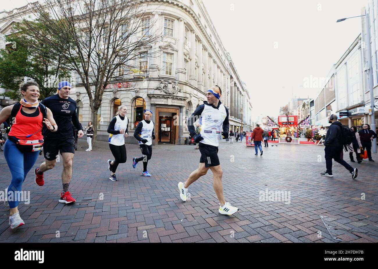 Kevin Sinfield crosses Long Row in Nottingham city centre during the ...
