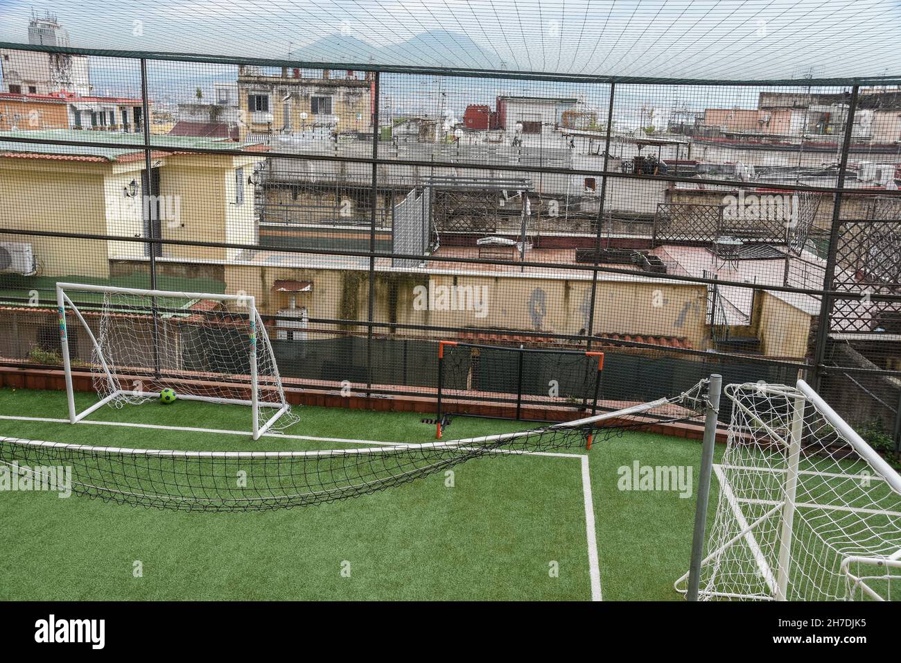 Small football pitch in Naples, Italy, with Mount Vesuvius in the ...