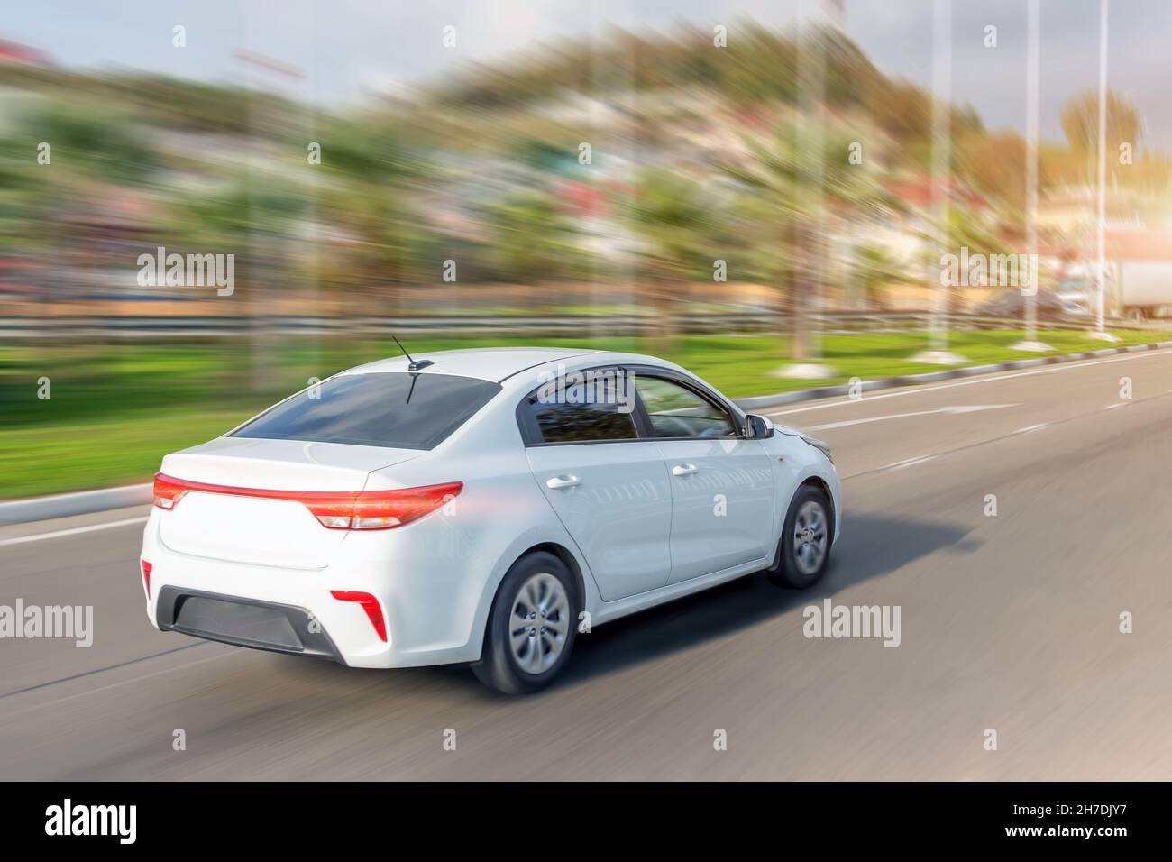 Car driving on freeway during the day in the city, motion blur Stock ...