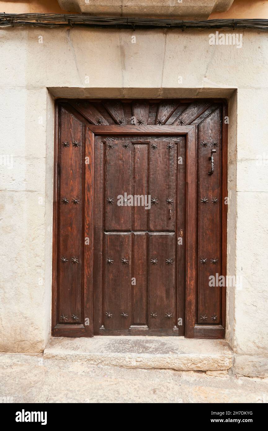 Stone wall with old entrance and wooden door Stock Photo - Alamy
