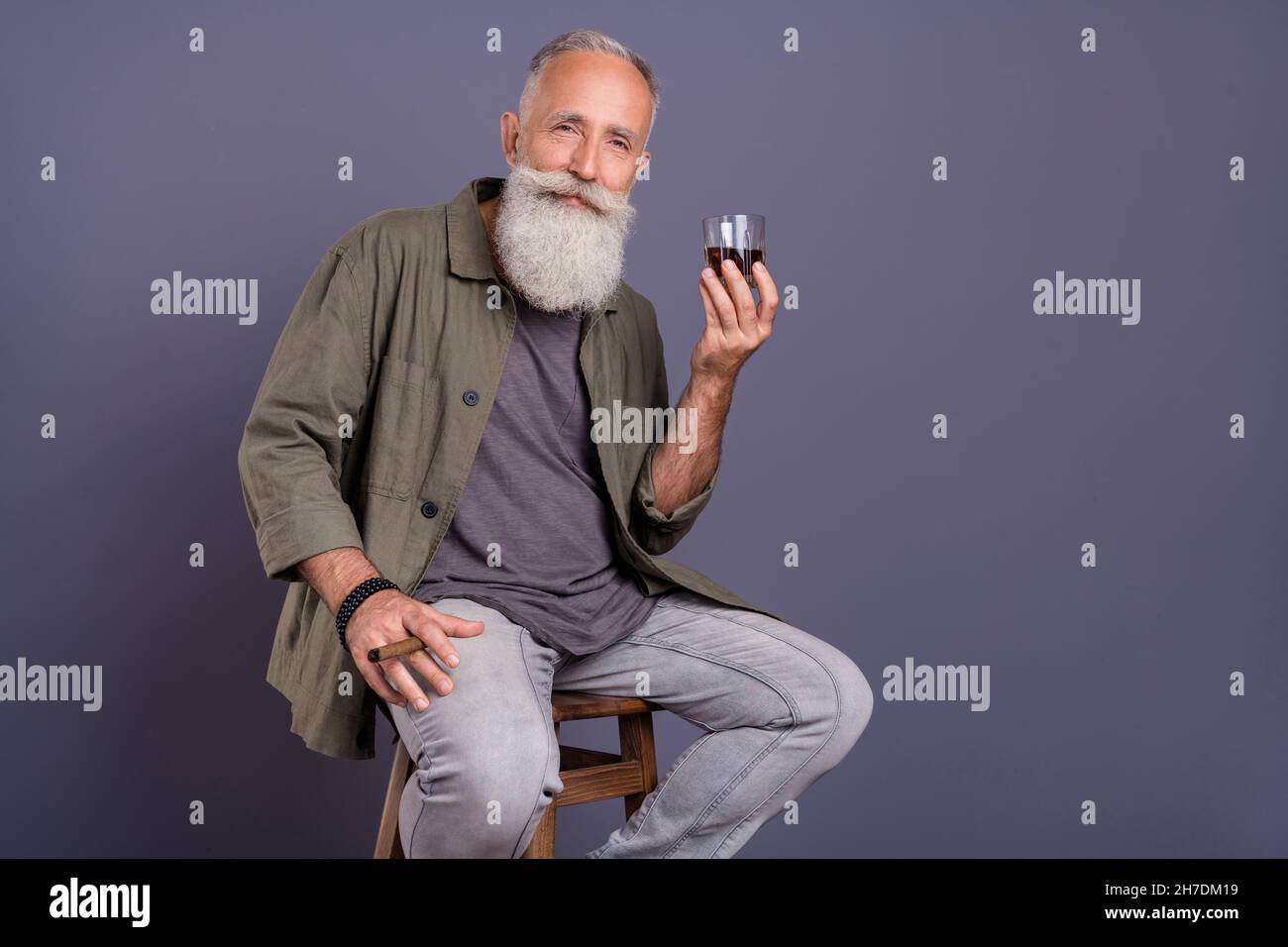 Photo of senior rich man drinking cognac sit restaurant free-time ...
