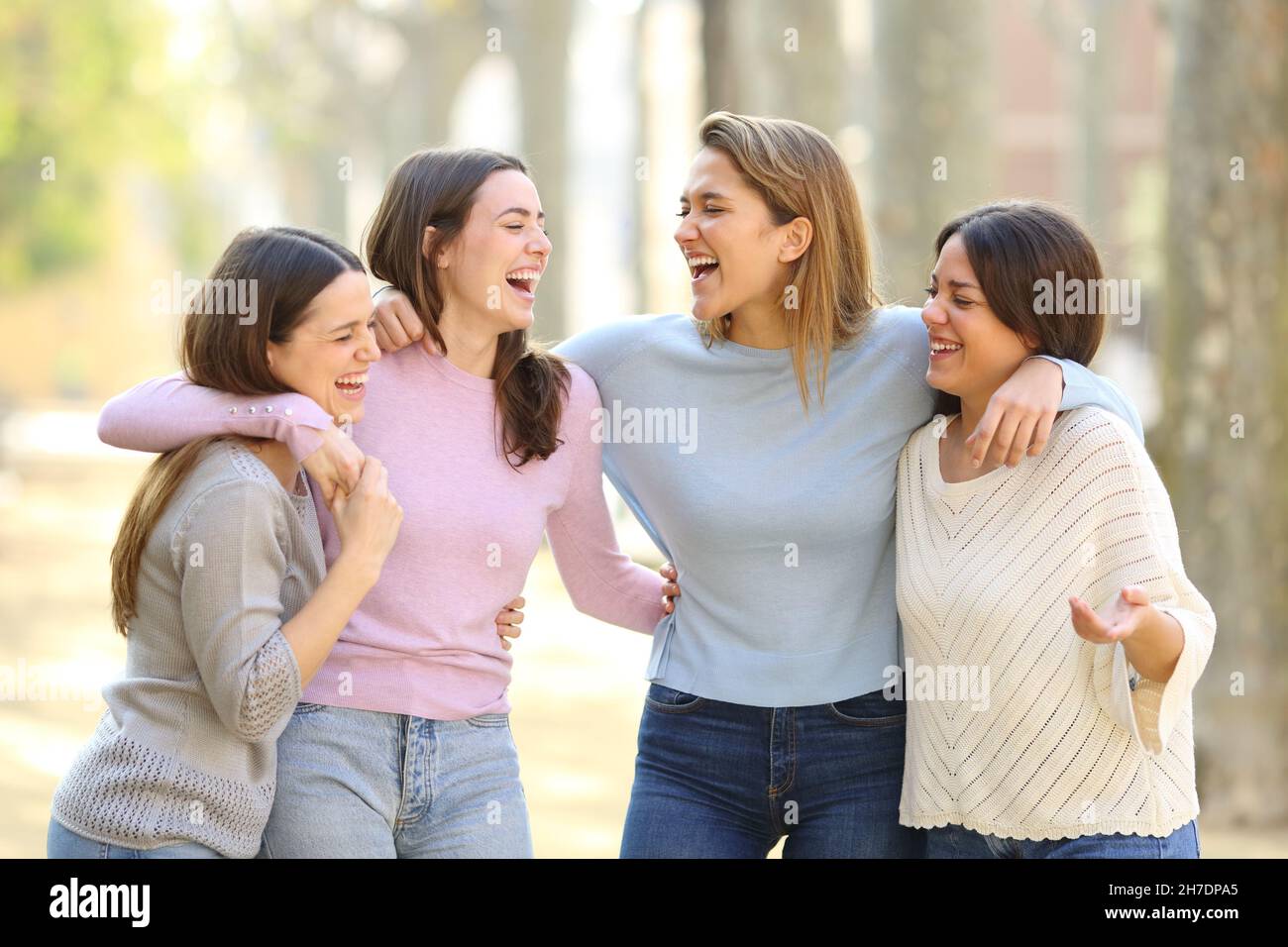 Four happy hi-res stock photography and images - Alamy