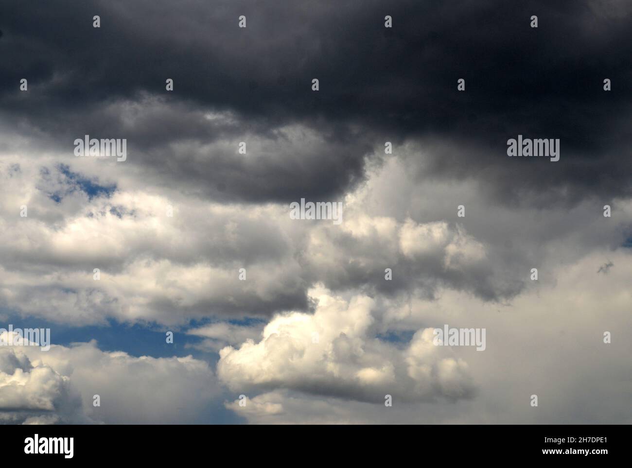 Dark rainy sky background, heavy scary clouds. Storm, hurricane and ...