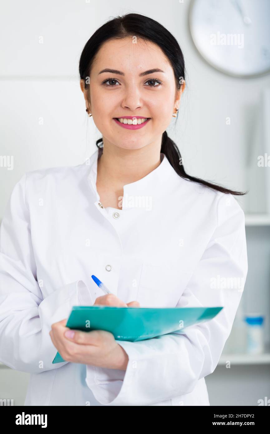 Nurse arranging appointment Stock Photo - Alamy