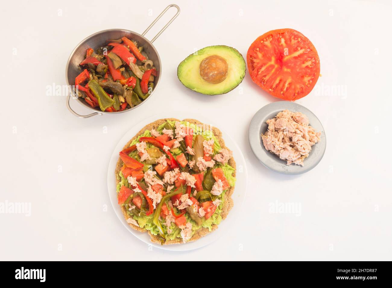 Mexican food- integral fajita with tuna, pepper, tomato and avocado ...