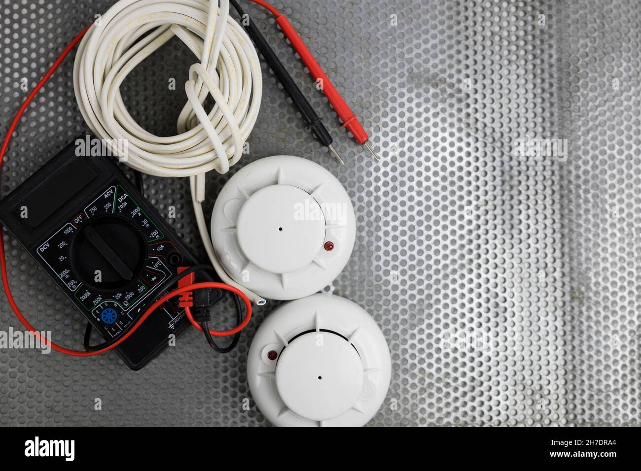 Installation of a new fire alarm system, smart home Stock Photo - Alamy