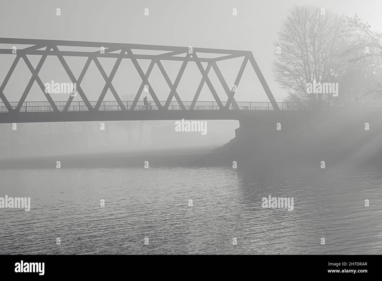 a bridge in the morning mist Stock Photo - Alamy