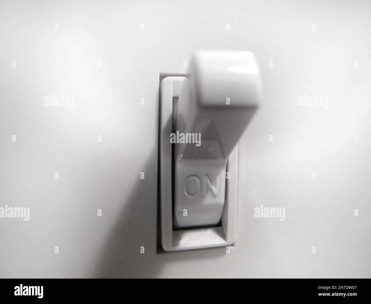 Closeup of on off light switch for power in house turned up on Stock ...