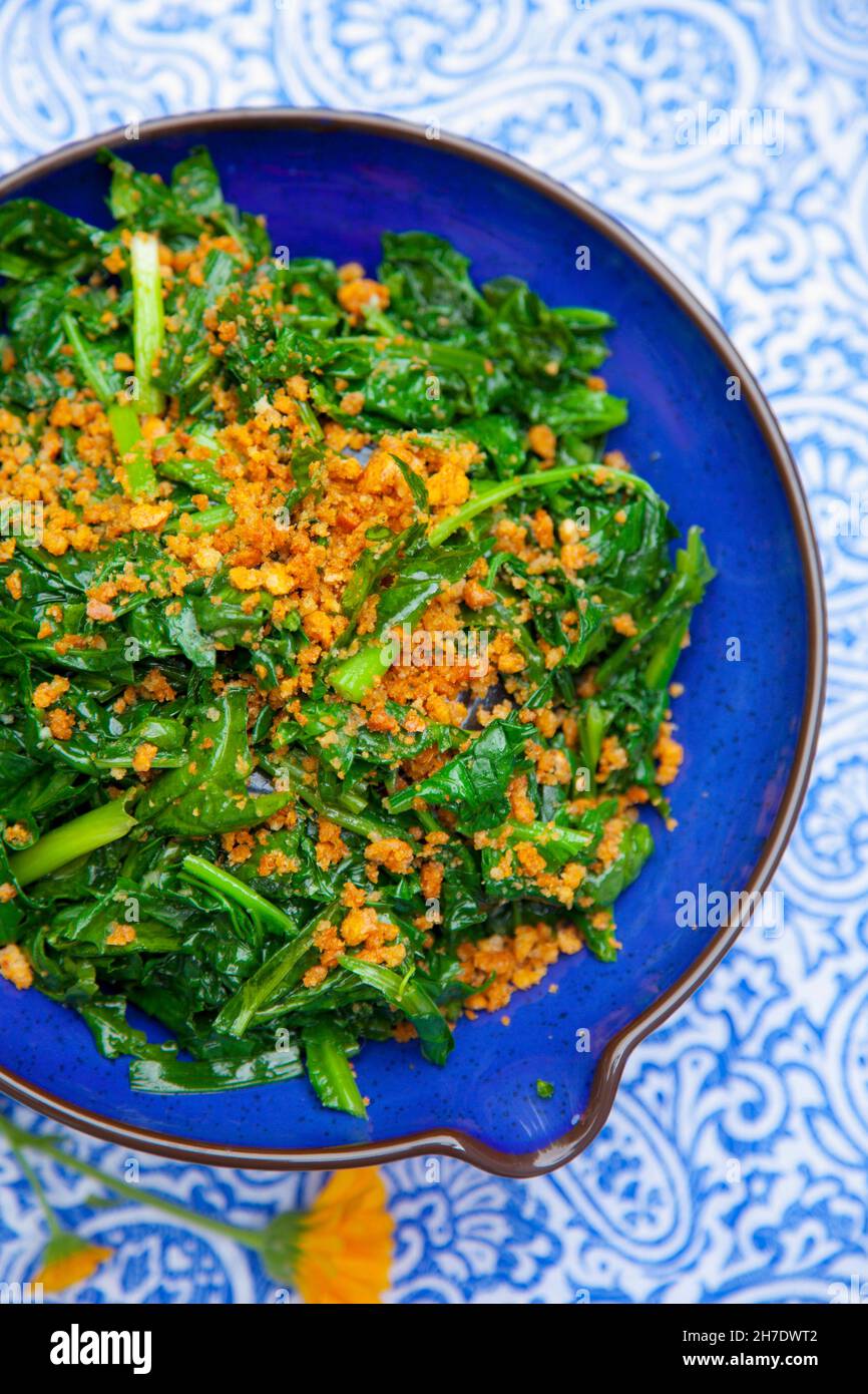 Spinach with crispy crumbs Stock Photo - Alamy