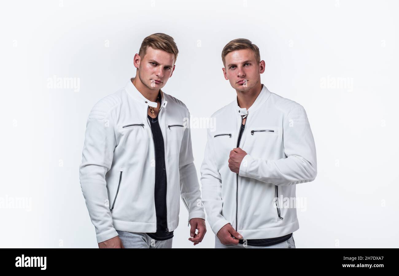 twin brothers men in white casual clothes look alike, identically Stock ...