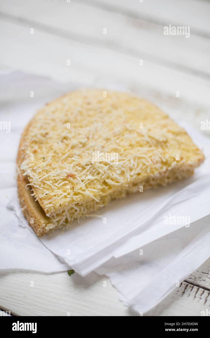 Mozzarella in carozza (Italian fried mozzarella sandwich) sprinkled ...