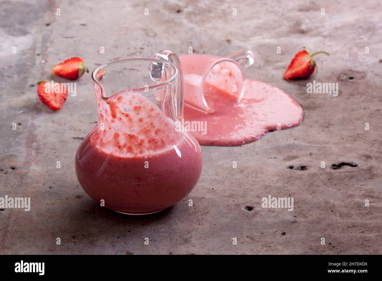 Strawberry milkshake spilling hi-res stock photography and images - Alamy