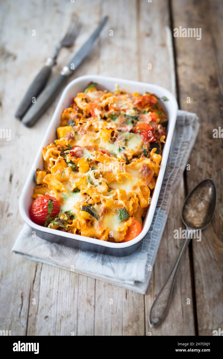 Mediterranean pasta bake in an ovenproof baking dish Stock Photo - Alamy