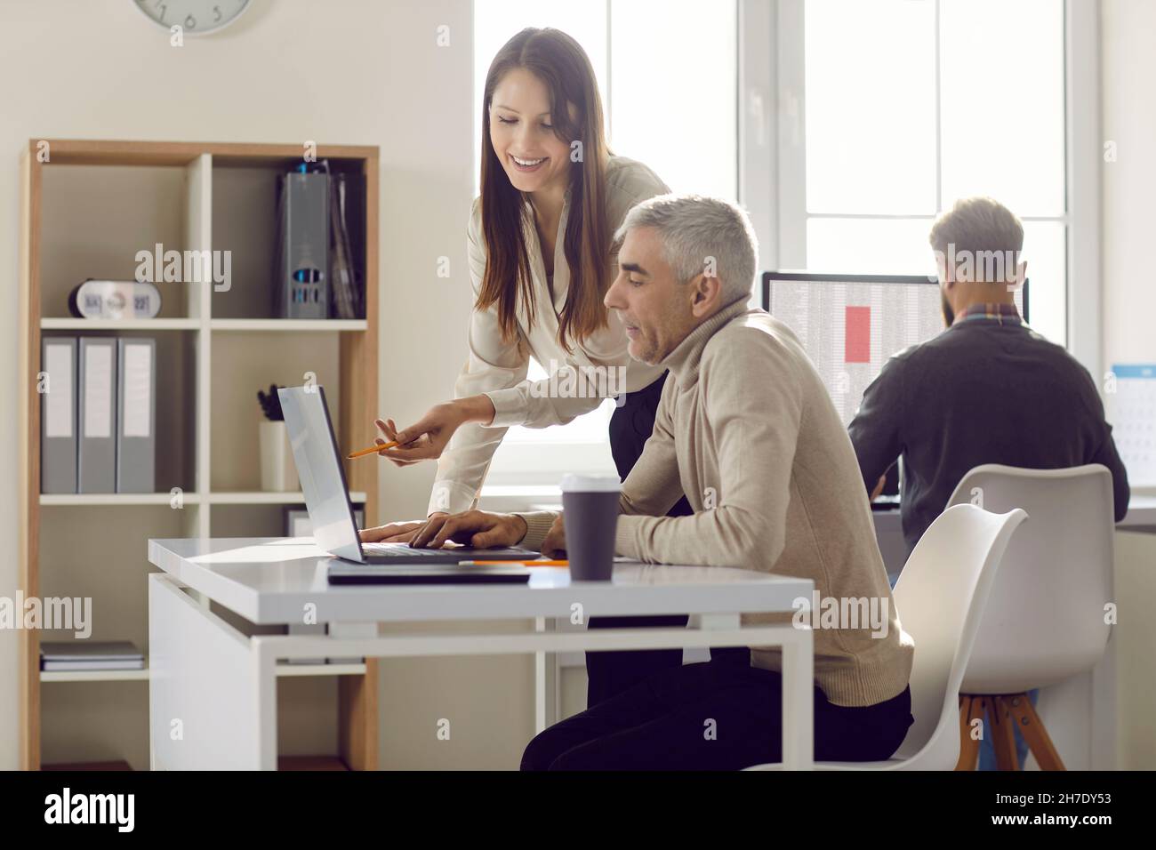 Employee with laptop hi-res stock photography and images - Alamy