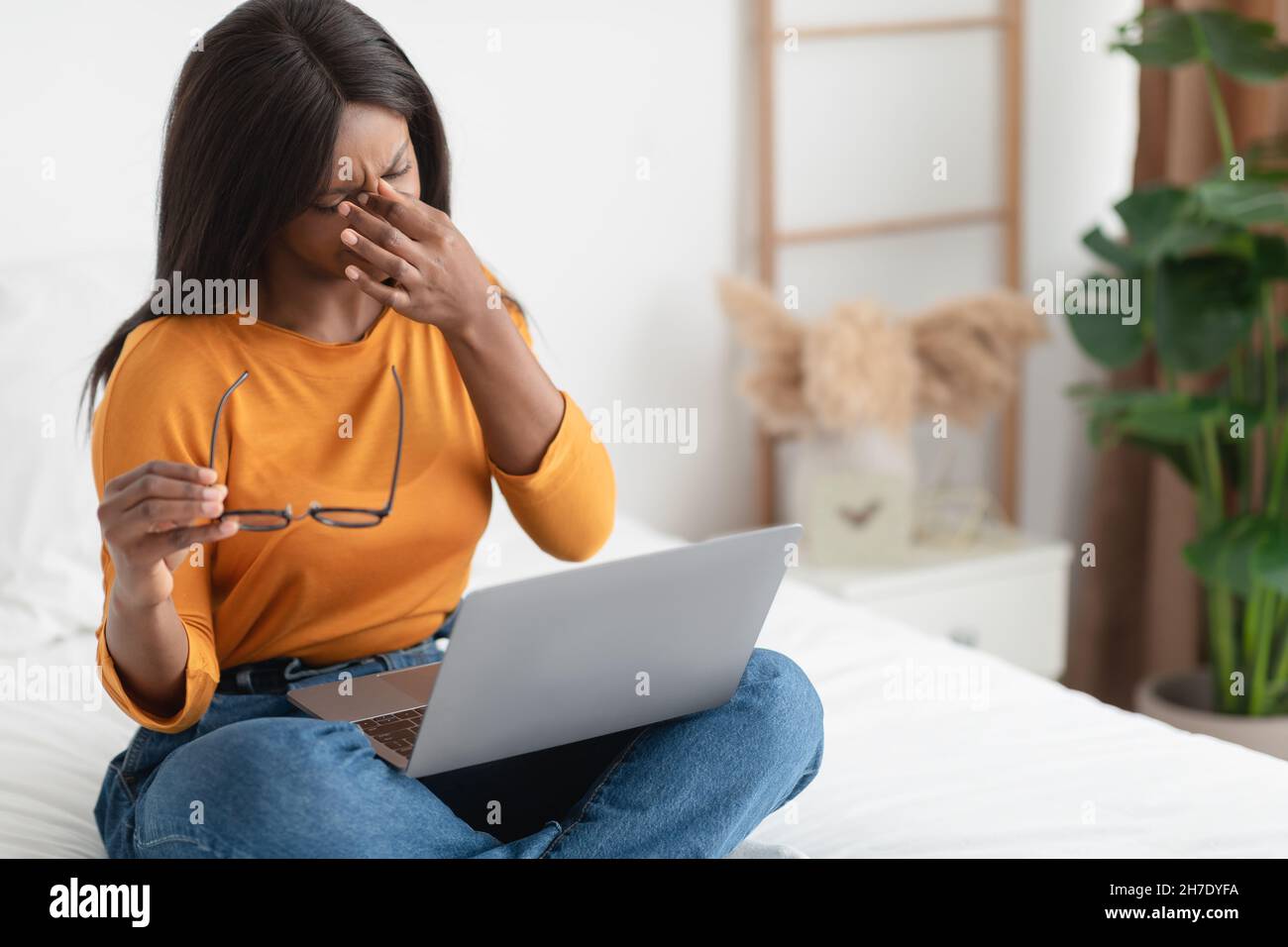 African american woman taking off hi-res stock photography and images ...