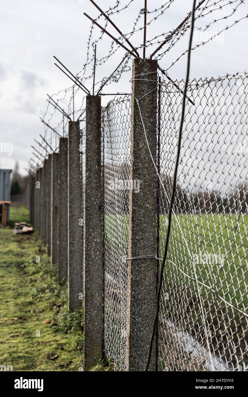 Prison camp fence hi-res stock photography and images - Alamy