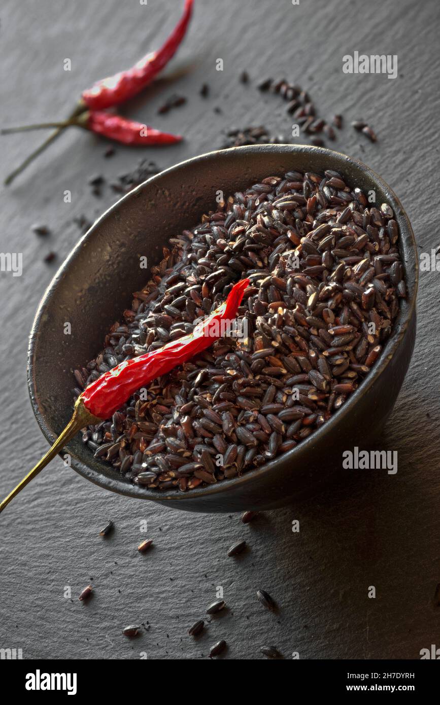 Raw black rice chili hi-res stock photography and images - Alamy