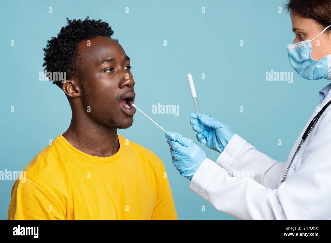 PCR Coronavirus Test. Doctor Taking Swab From Black Male Patient's ...