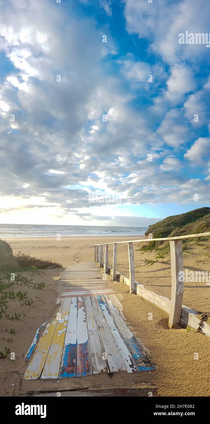 Wooden path to an wonderful beach at the southern coast of spain at the ...