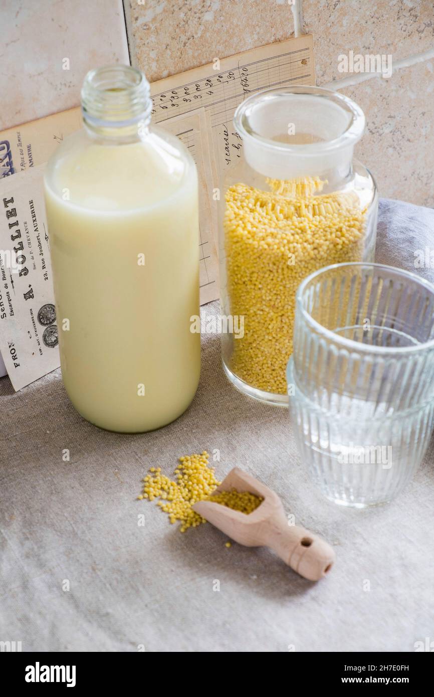 A bottle of millet milk and millet Stock Photo - Alamy