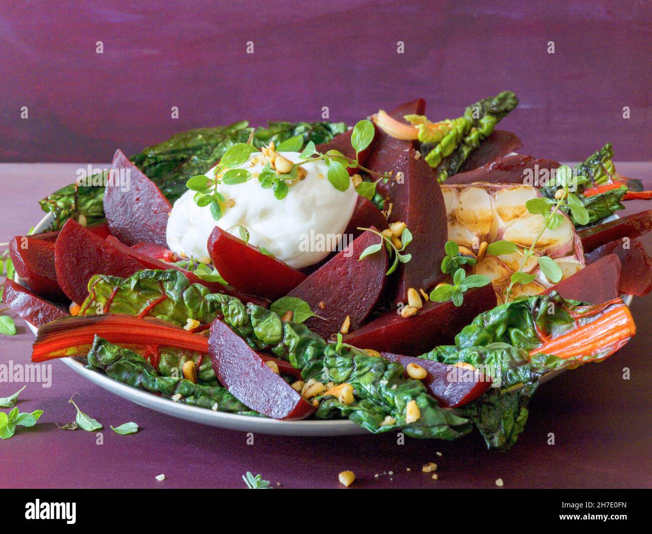Burrata with chard, beetroot and garlic Stock Photo - Alamy