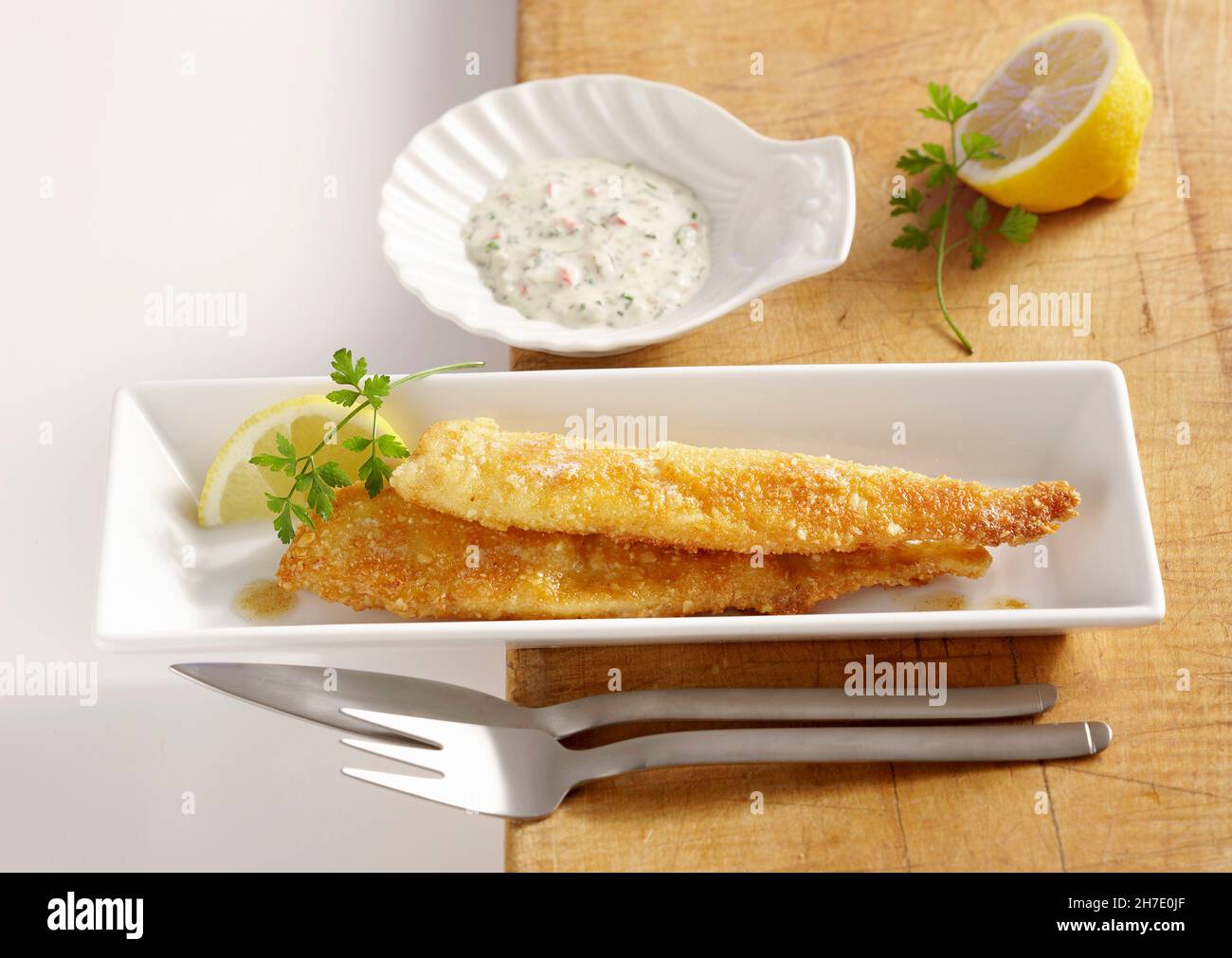 Plaice fillets with an almond crust Stock Photo - Alamy