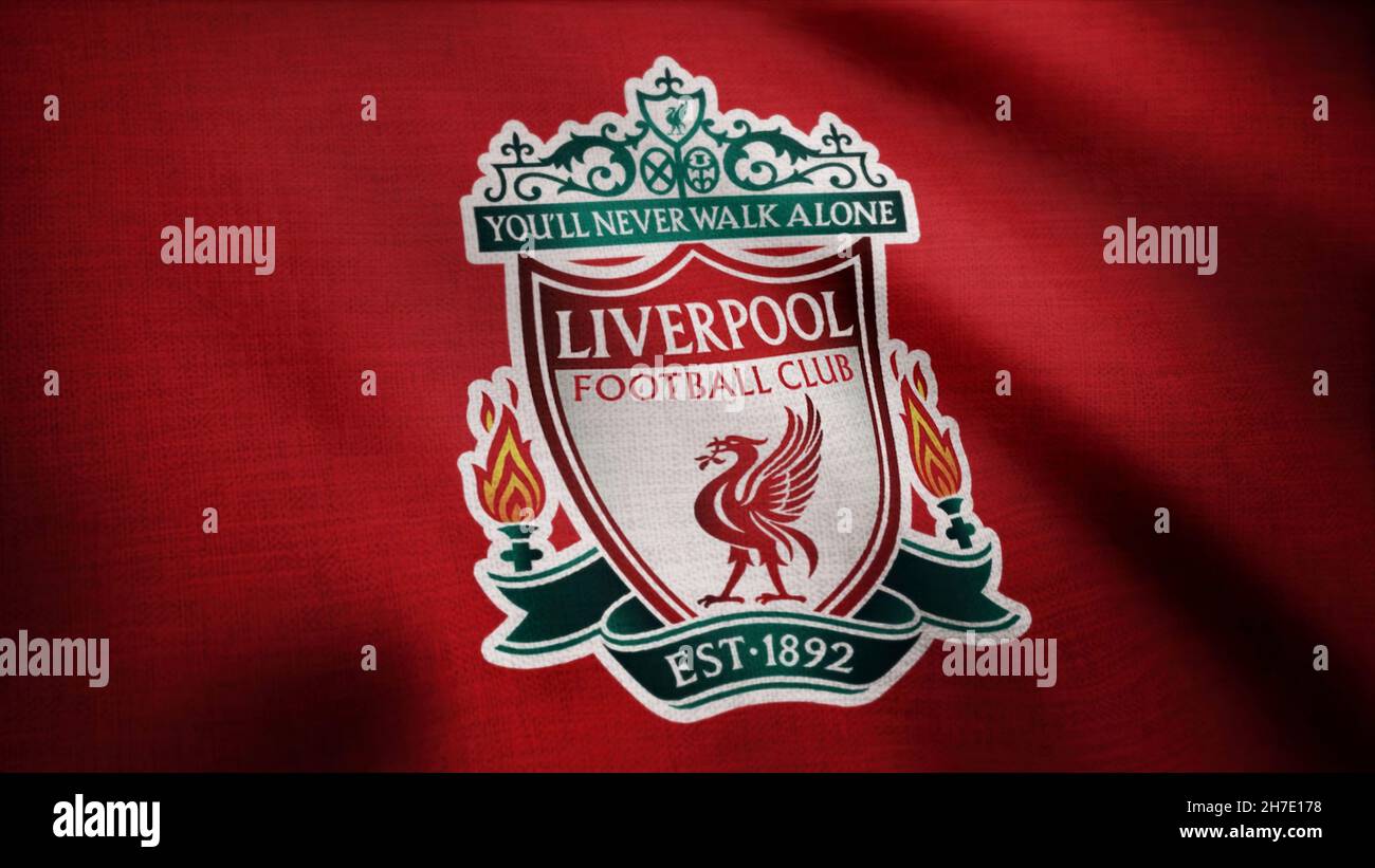 Close-up of waving flag with FC Liverpool football club logo, seamless ...