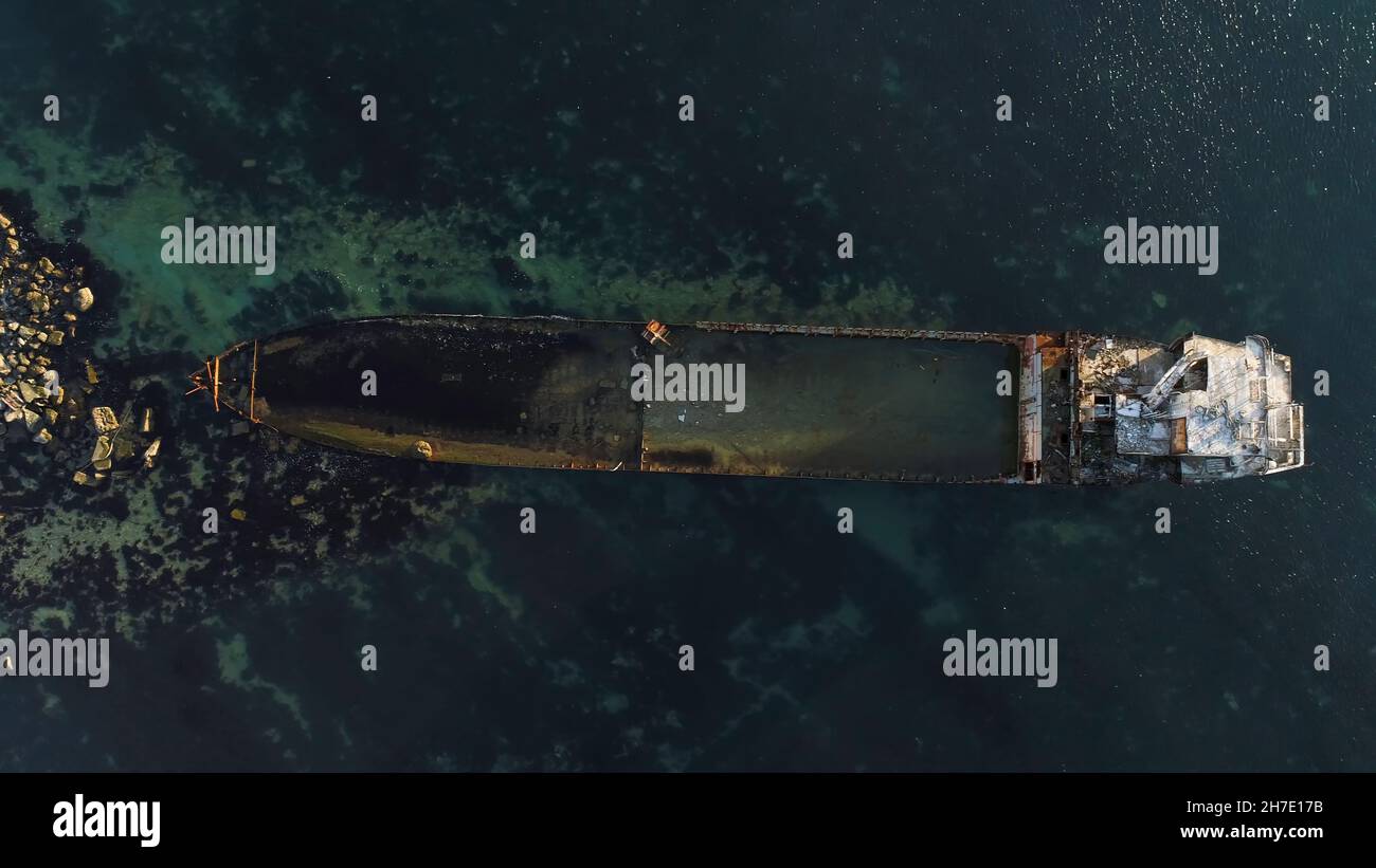 Aerial view of the ship washed ashore. Shot. Top view of an abandoned ...