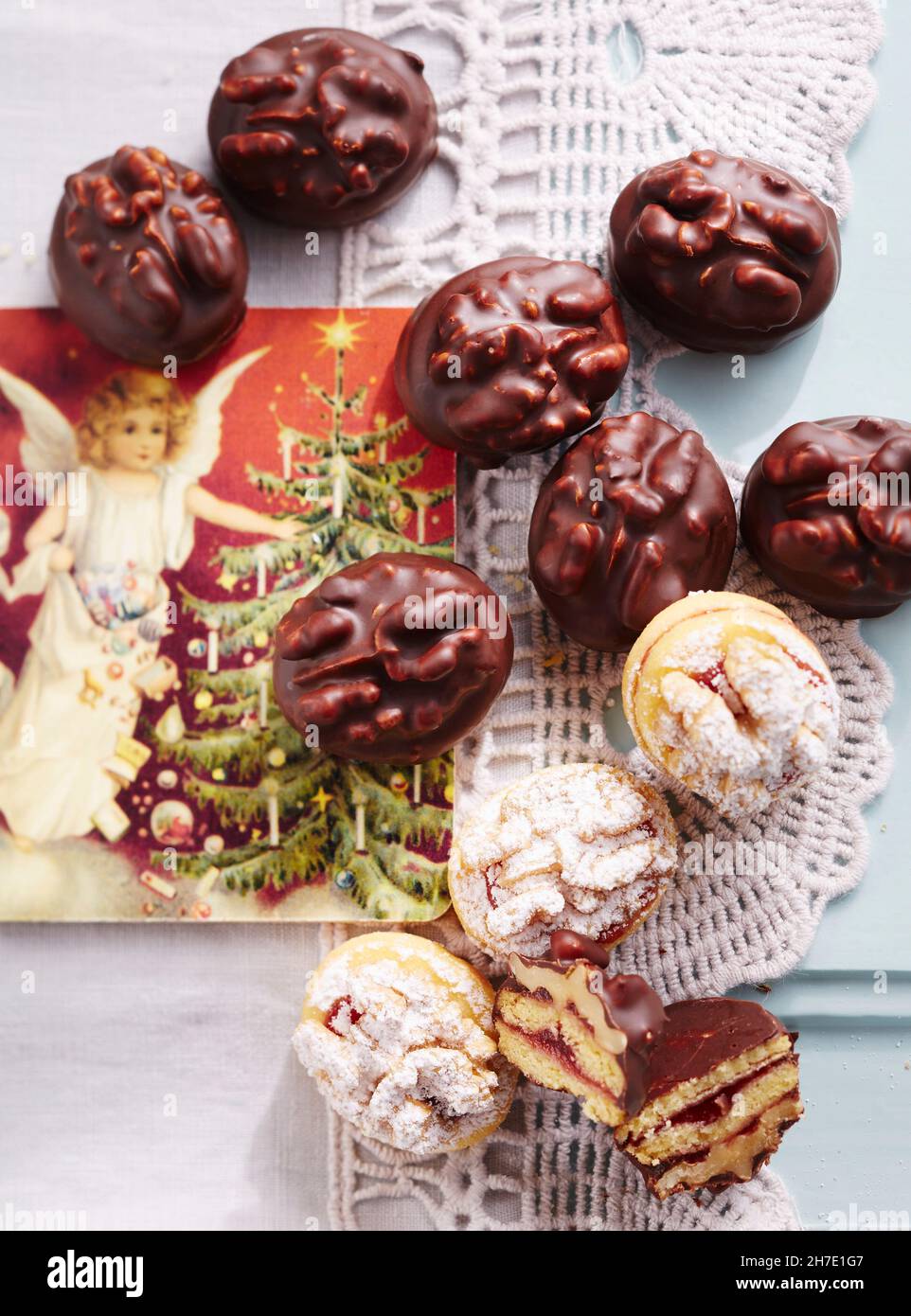 Oval walnut and raspberry biscuits with jam and chocolate glaze Stock ...