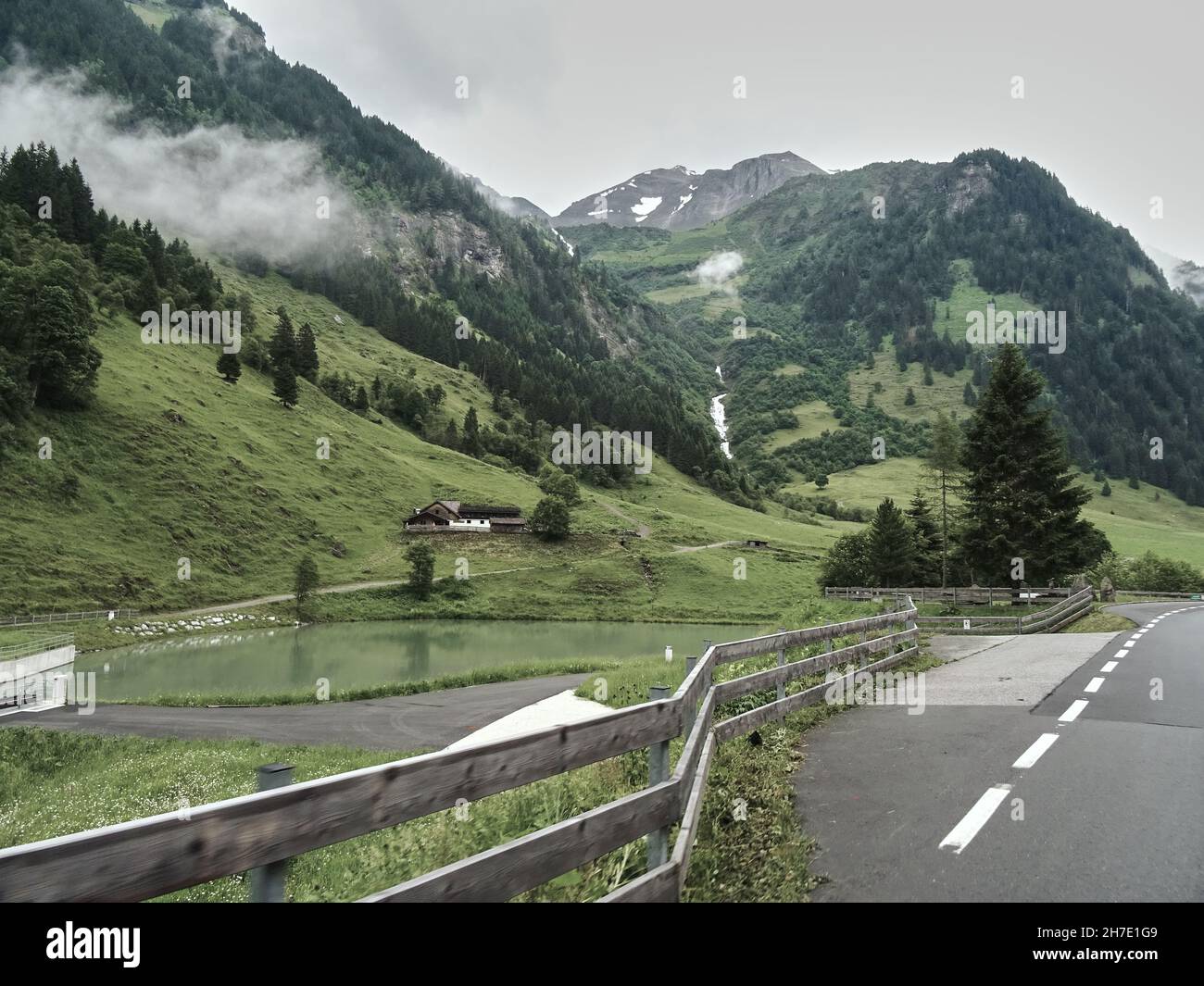 Alpine road in mounts. Road to the hight mountains. Panoramic Landscape ...