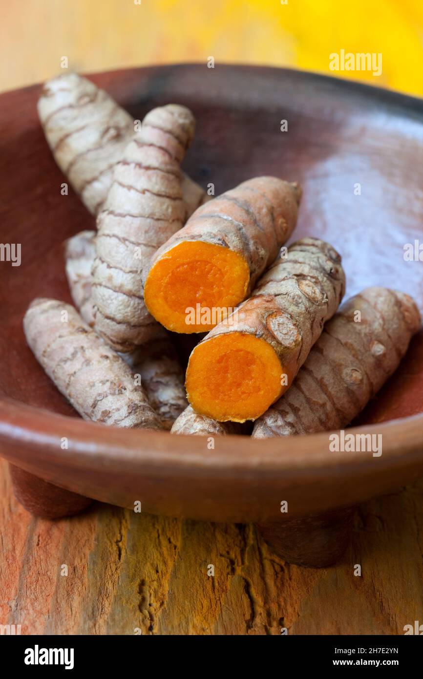 Turmeric roots, sliced Stock Photo - Alamy