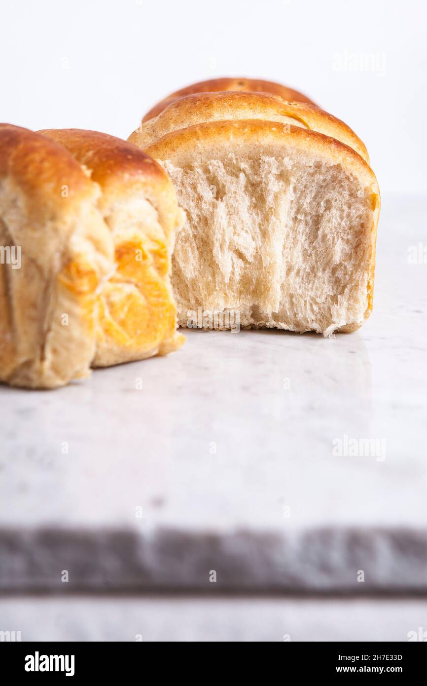 Milk bread rolls in the shape of a loaf Stock Photo - Alamy