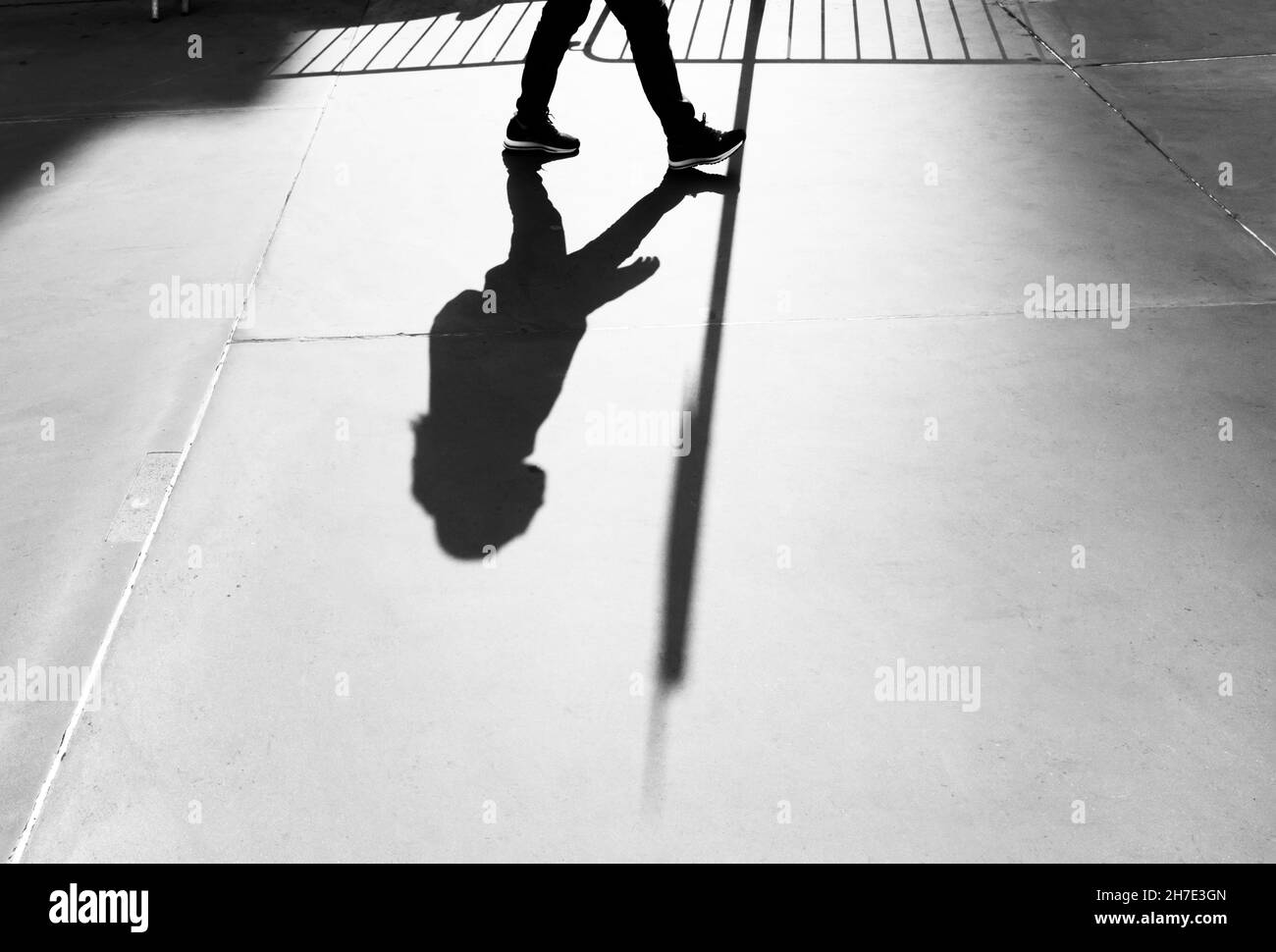 Light and shadows in New York City. Shadows of people walking street in ...