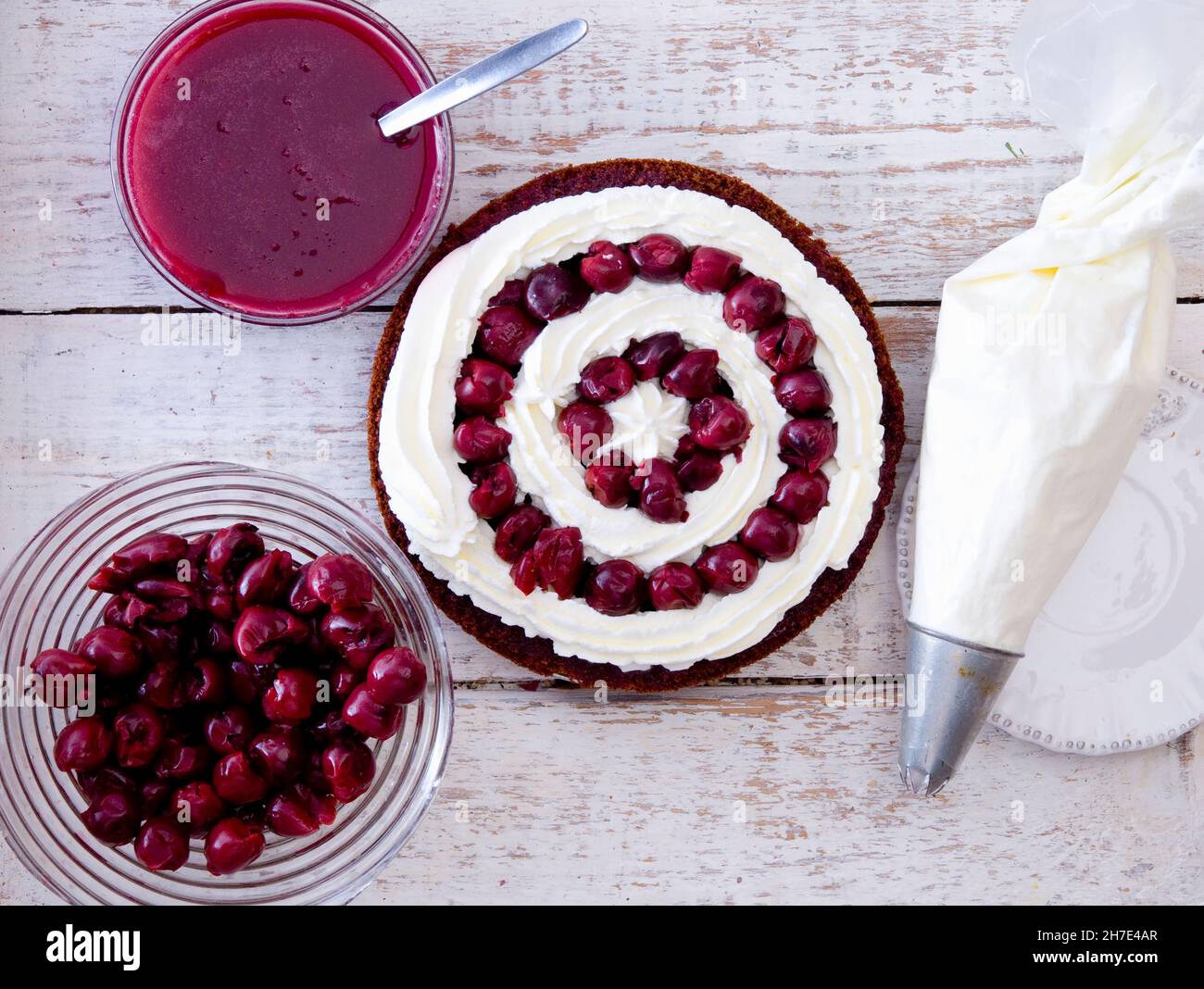 Black Forest gateau being made Stock Photo - Alamy