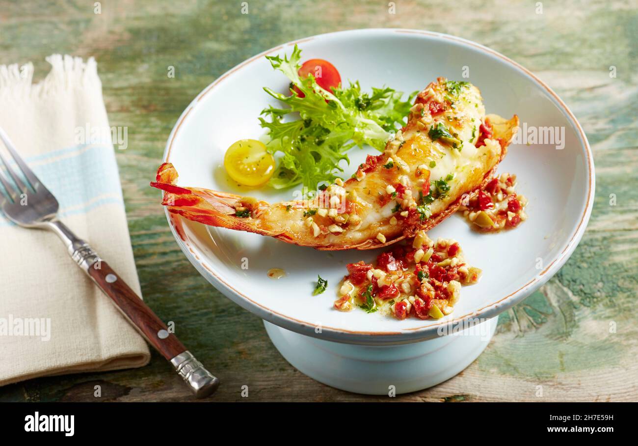 Fried langoustine tail with an almond vinaigrette Stock Photo - Alamy