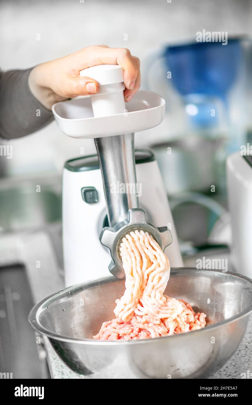 Woman using grinder preparation hi-res stock photography and images - Alamy