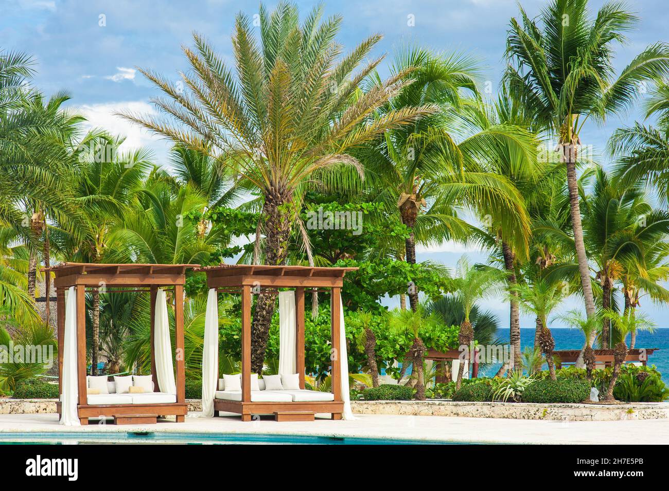 Swimming Pool at tropical beach - summer vacation background Stock ... Swimming Pool at tropical beach - summer vacation background Stock ...