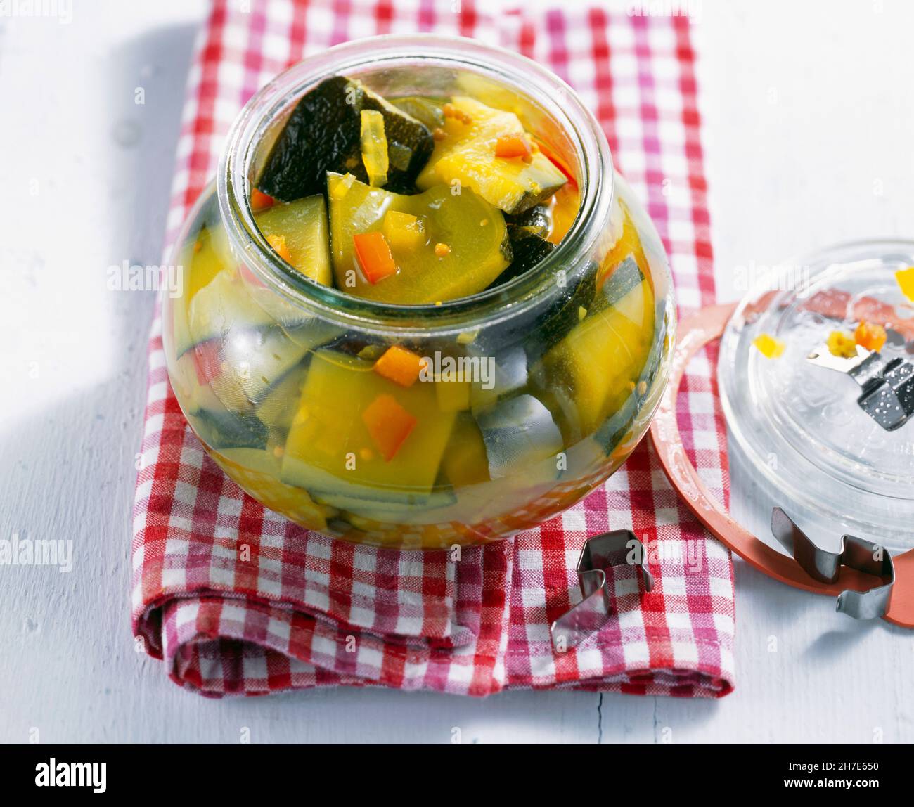 Pickled courgettes with turmeric and mustard seeds in a jar Stock Photo ...