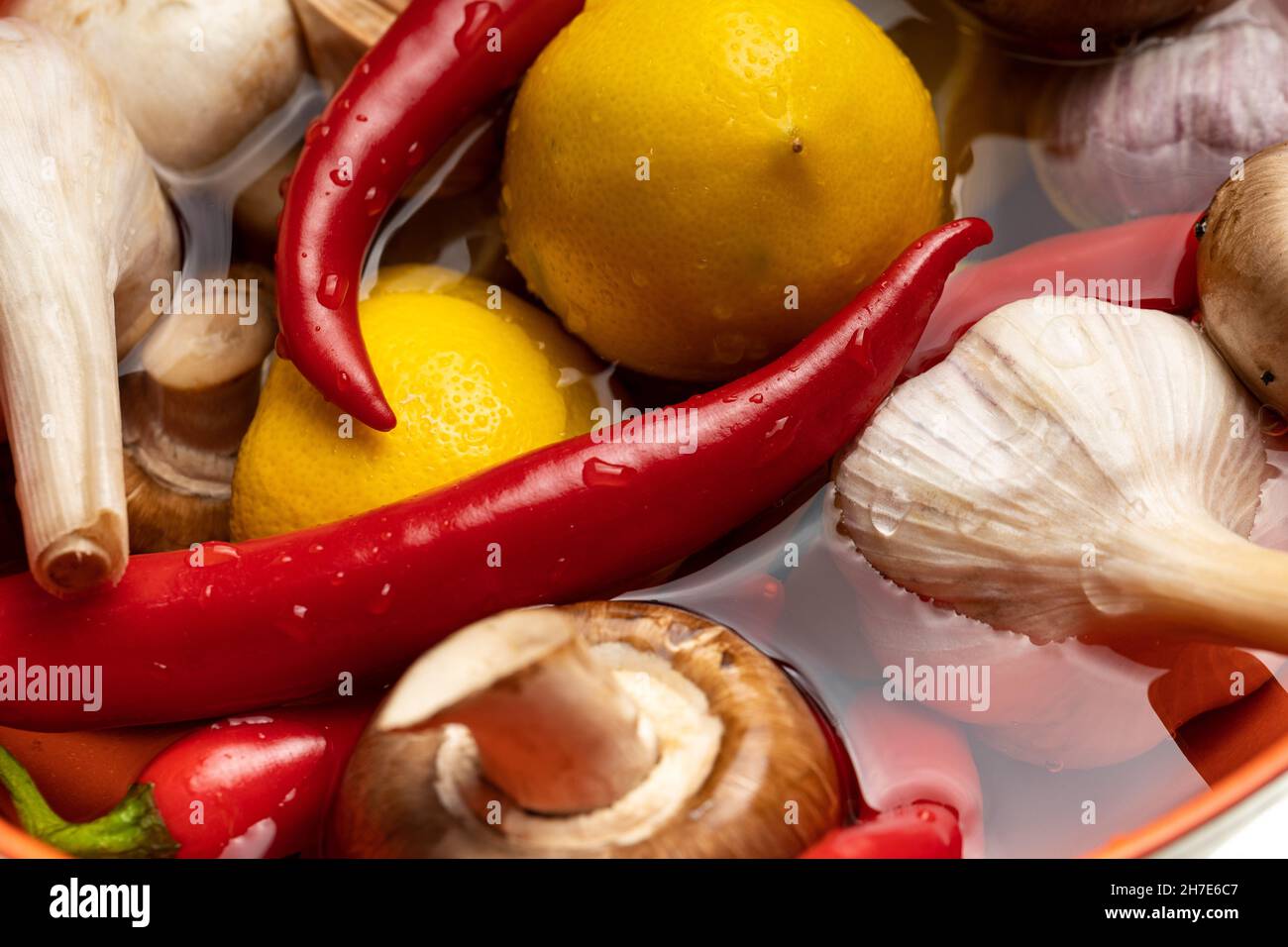 healthy vegetables are rinsed in a bowl with clean water Stock Photo ...